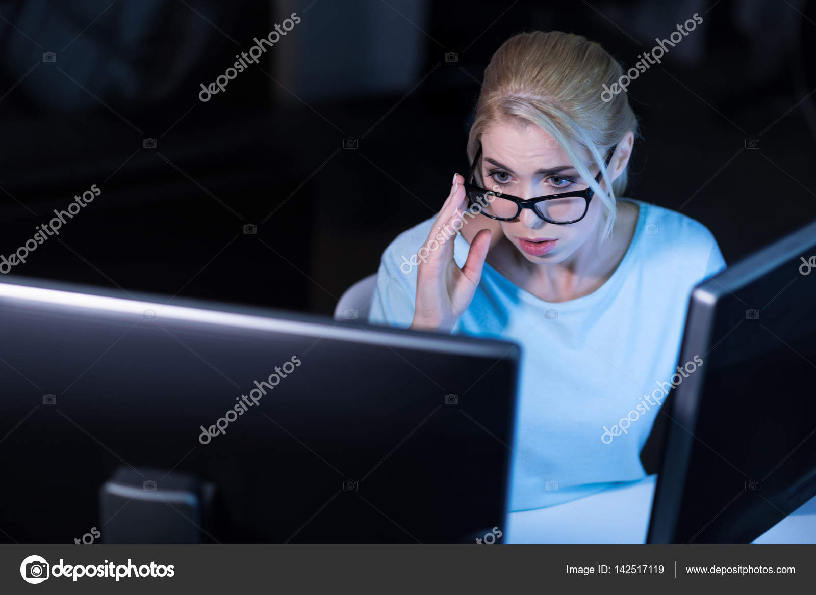 Amazed female programmer working in the office — Stock Photo © Dmyrto_Z ...