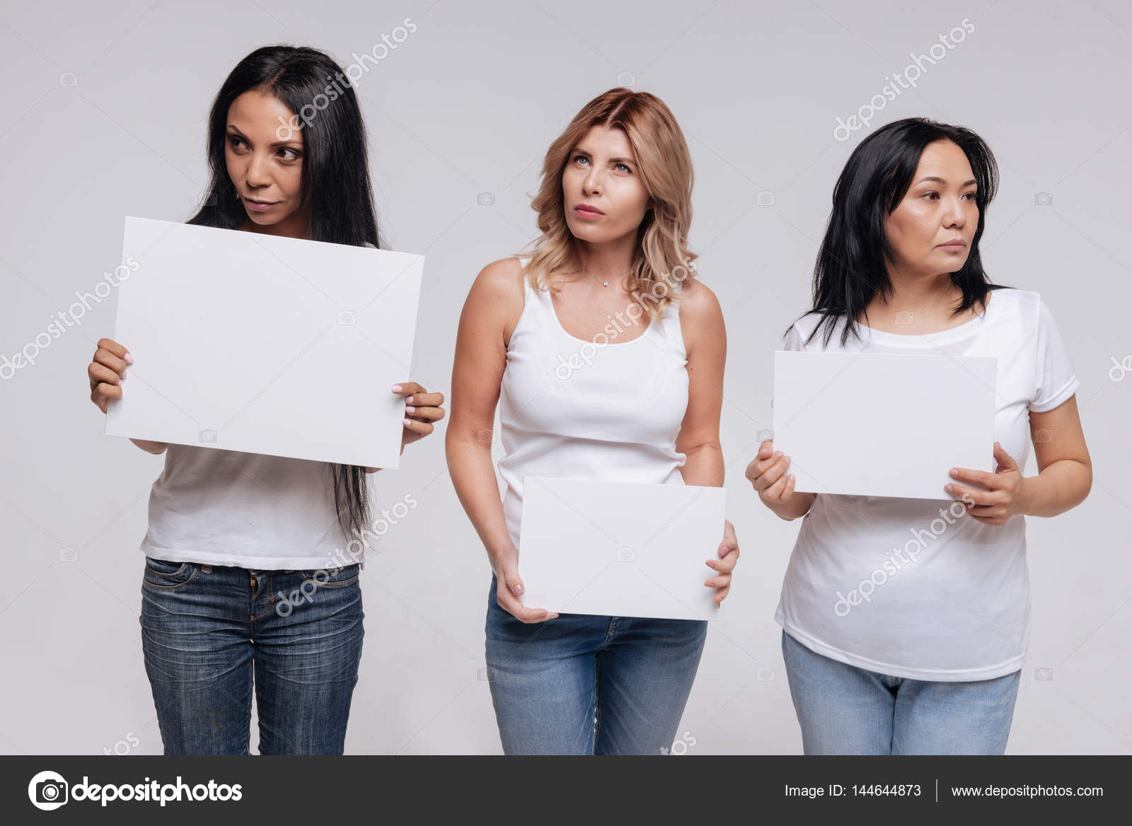 Artistic models holding up blank signs Stock Photo by ©Dmyrto_Z 144644873