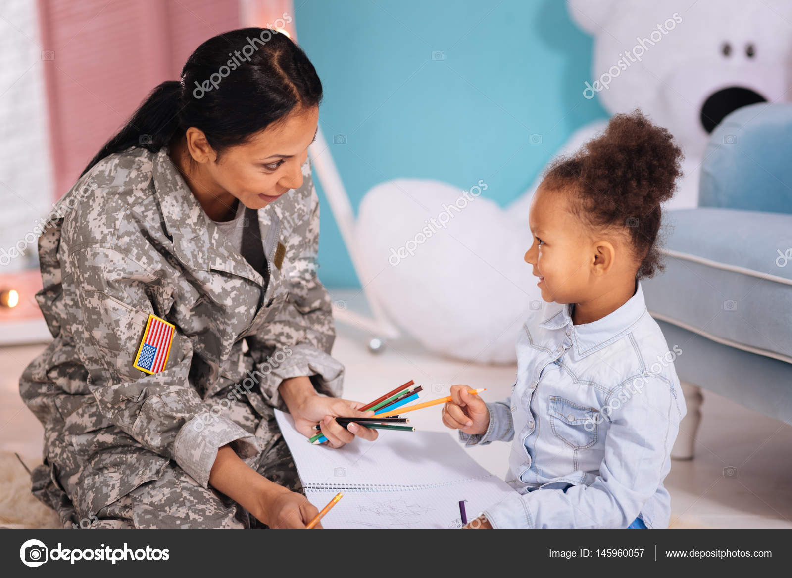 Beautiful lively ladies deciding on what to draw — Stock Photo © Dmyrto ...