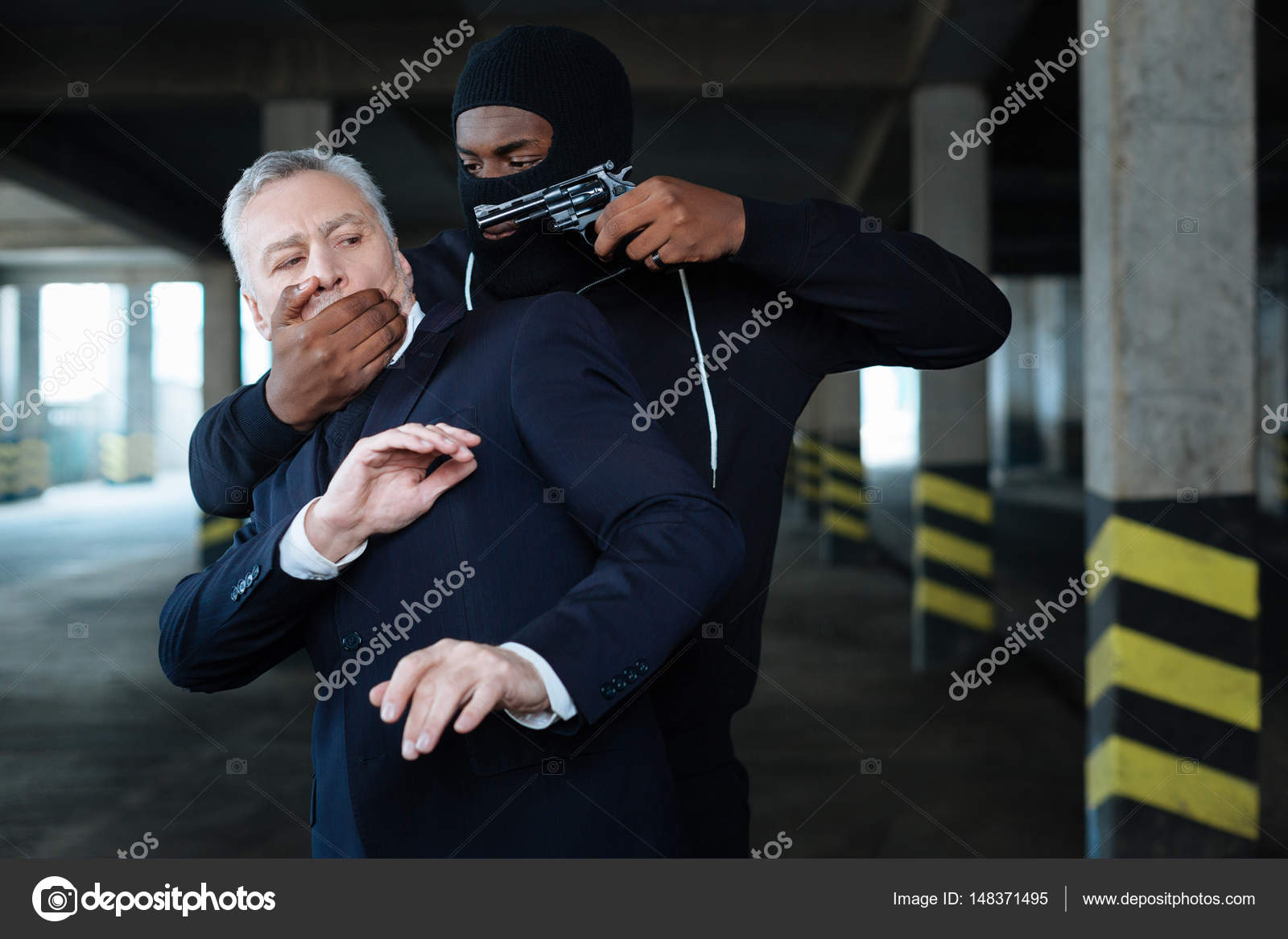 Aggressive dangerous criminal kidnapping a businessman Stock Photo by ...