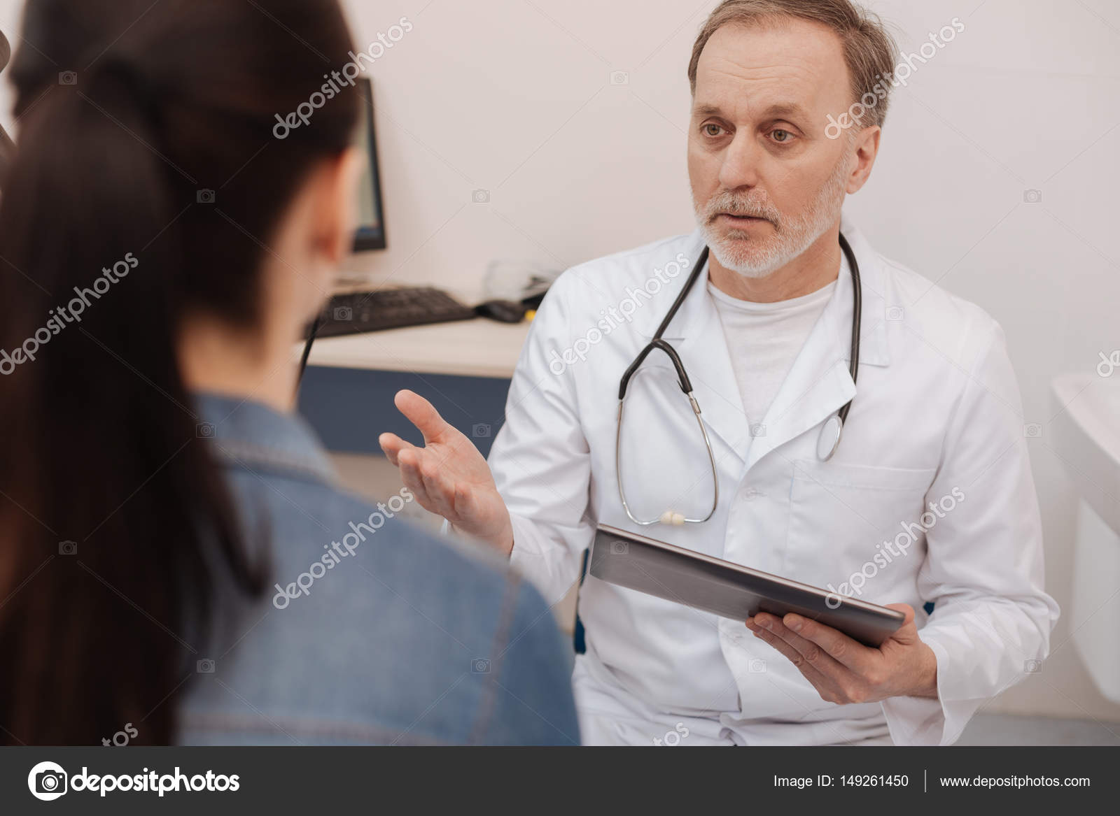 Trained experienced doctor informing his patient about treatment Stock ...