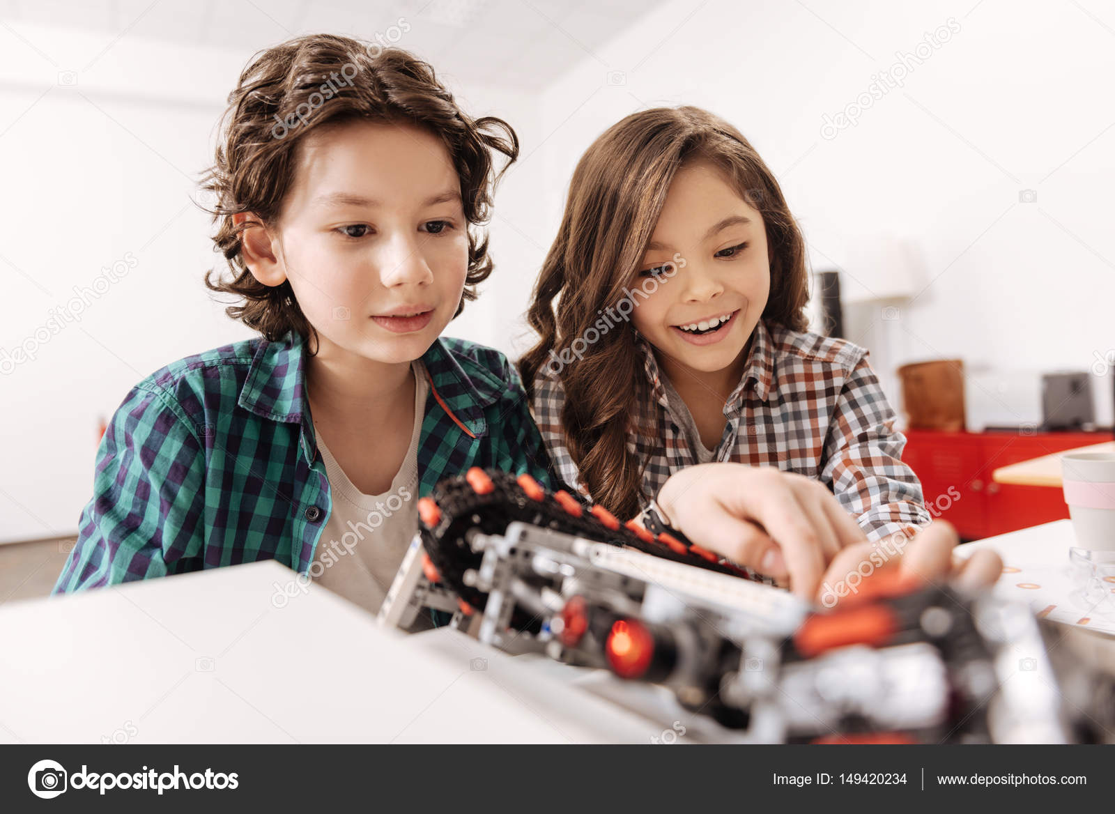 Happy kids programming robot in the science studio Stock Photo by ...