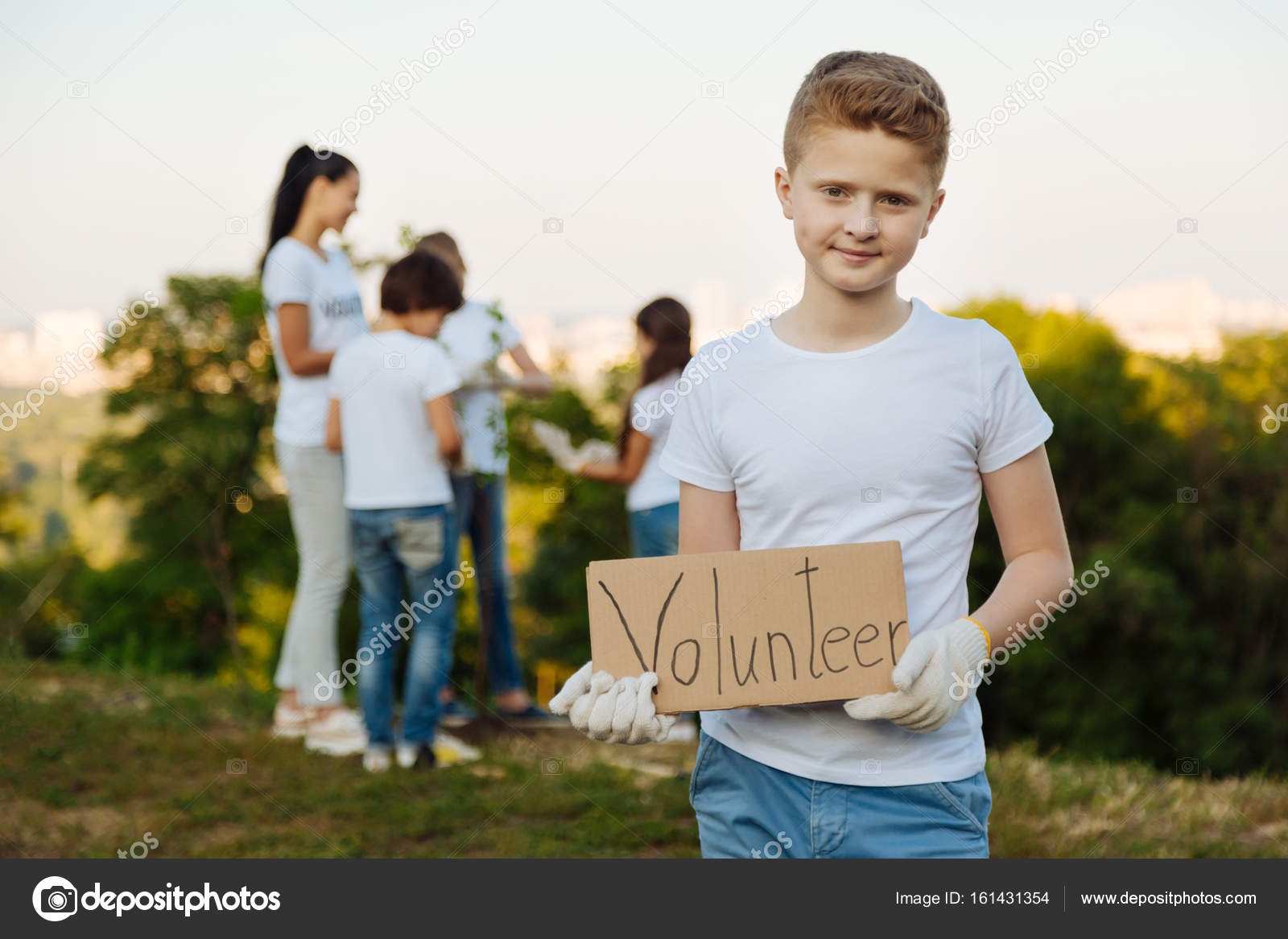 Boy inviting you to volunteer team — Stock Photo © Dmyrto_Z #161431354