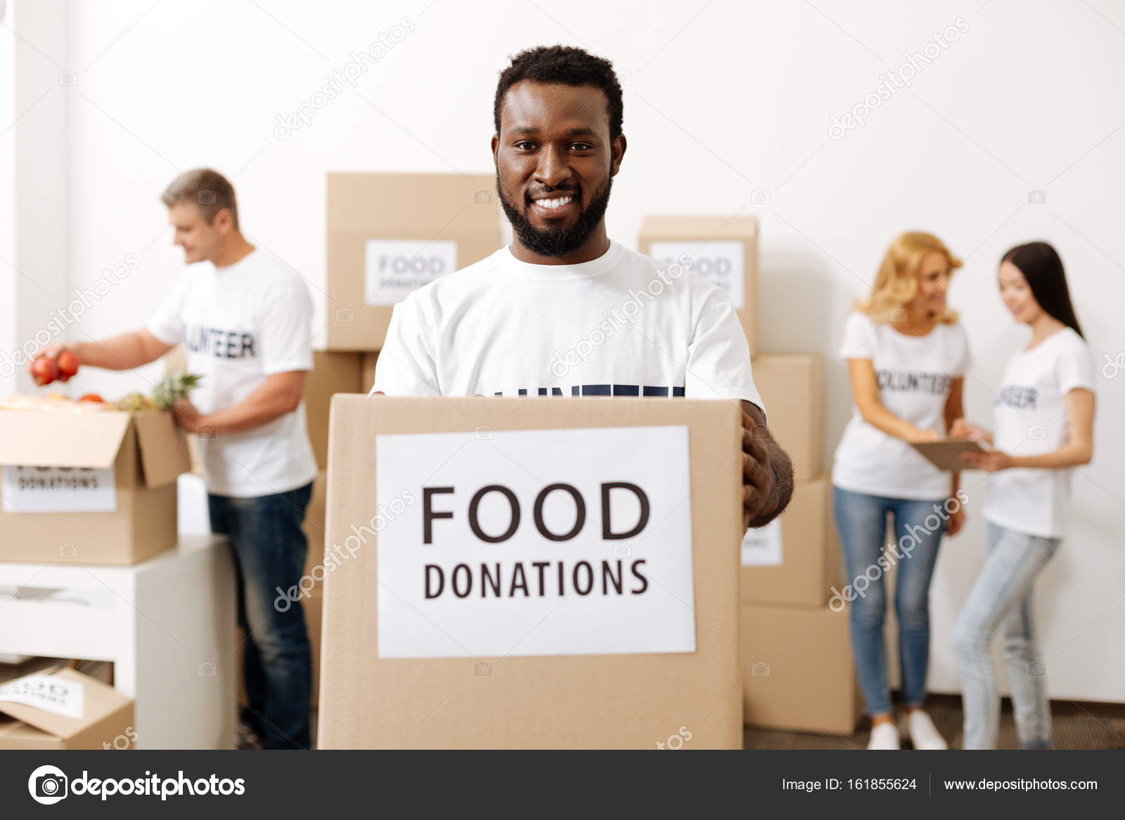 Generous lively man happy helping others Stock Photo by ©Dmyrto_Z 161855624