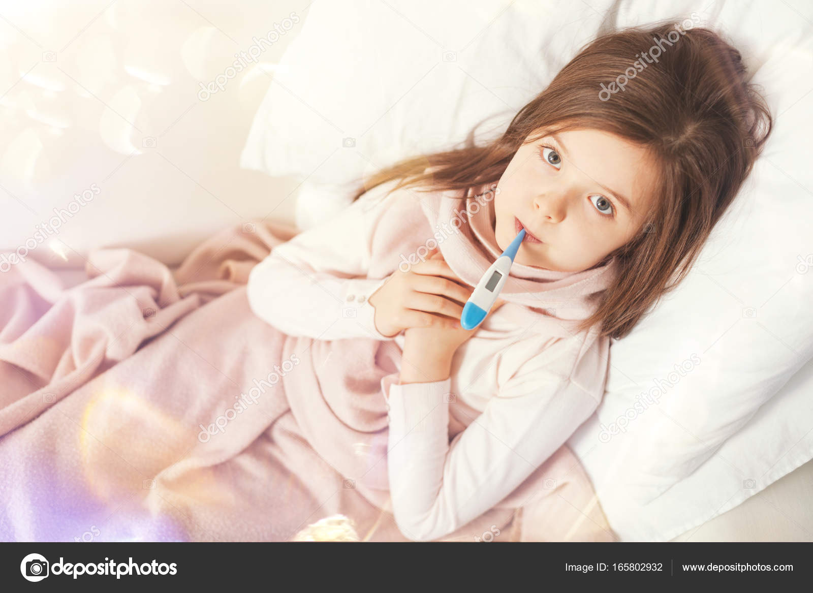 Sick kid looking straight at camera Stock Photo by ©Dmyrto_Z 165802932