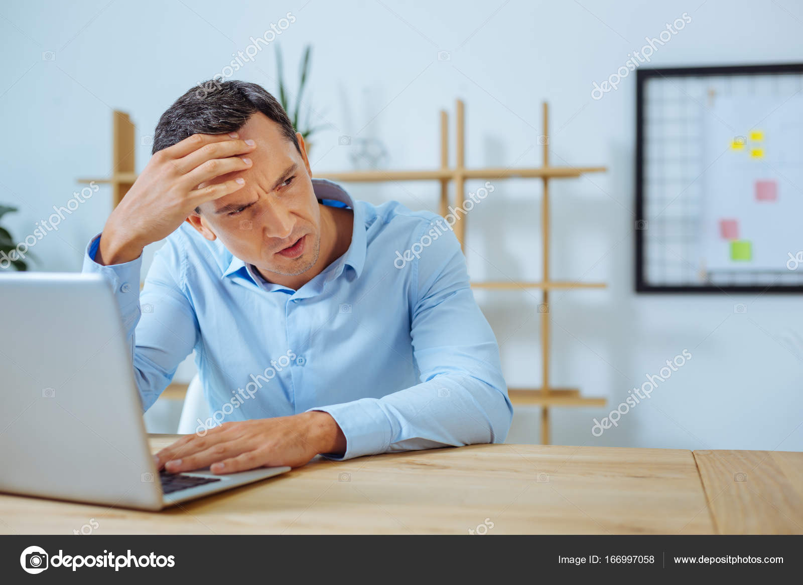 Confident male working with computer — Stock Photo © Dmyrto_Z #166997058