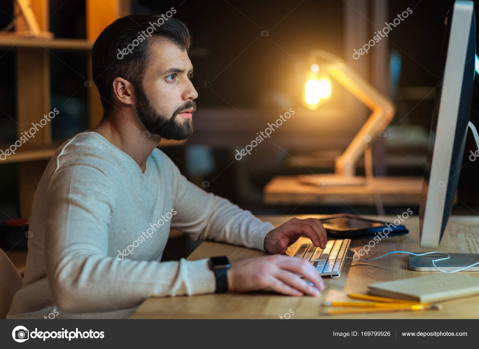 Attractive professional worker doing his job Stock Photo by ©Dmyrto_Z ...