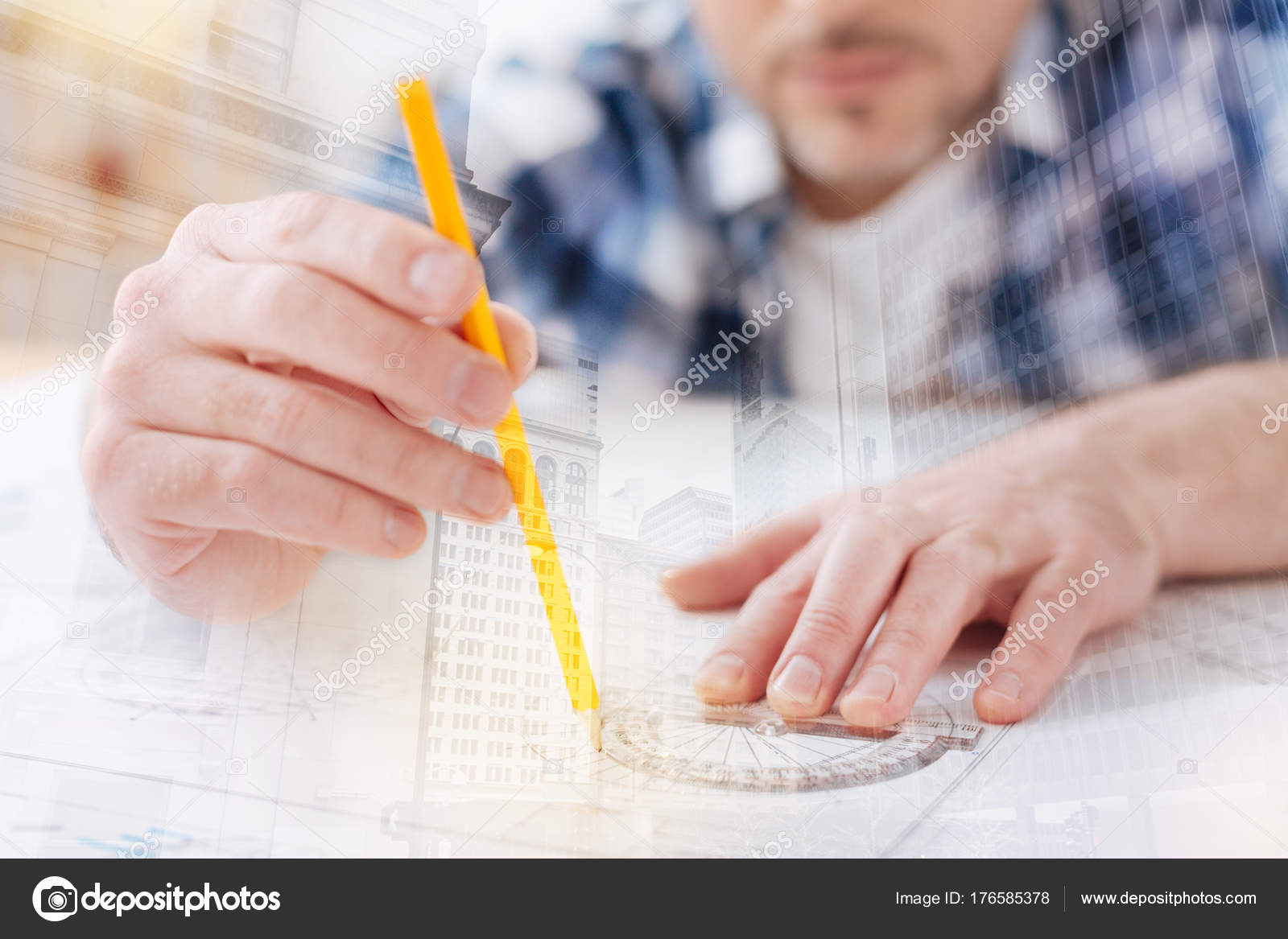 Skilled engineer taking measurements Stock Photo by ©Dmyrto_Z 176585378