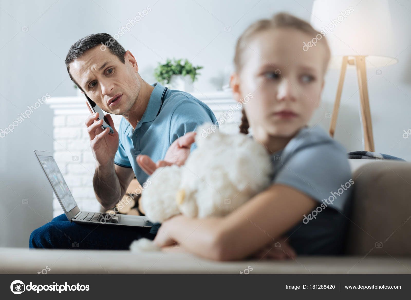 Preoccupied man working and talking on the phone — Stock Photo © Dmyrto ...