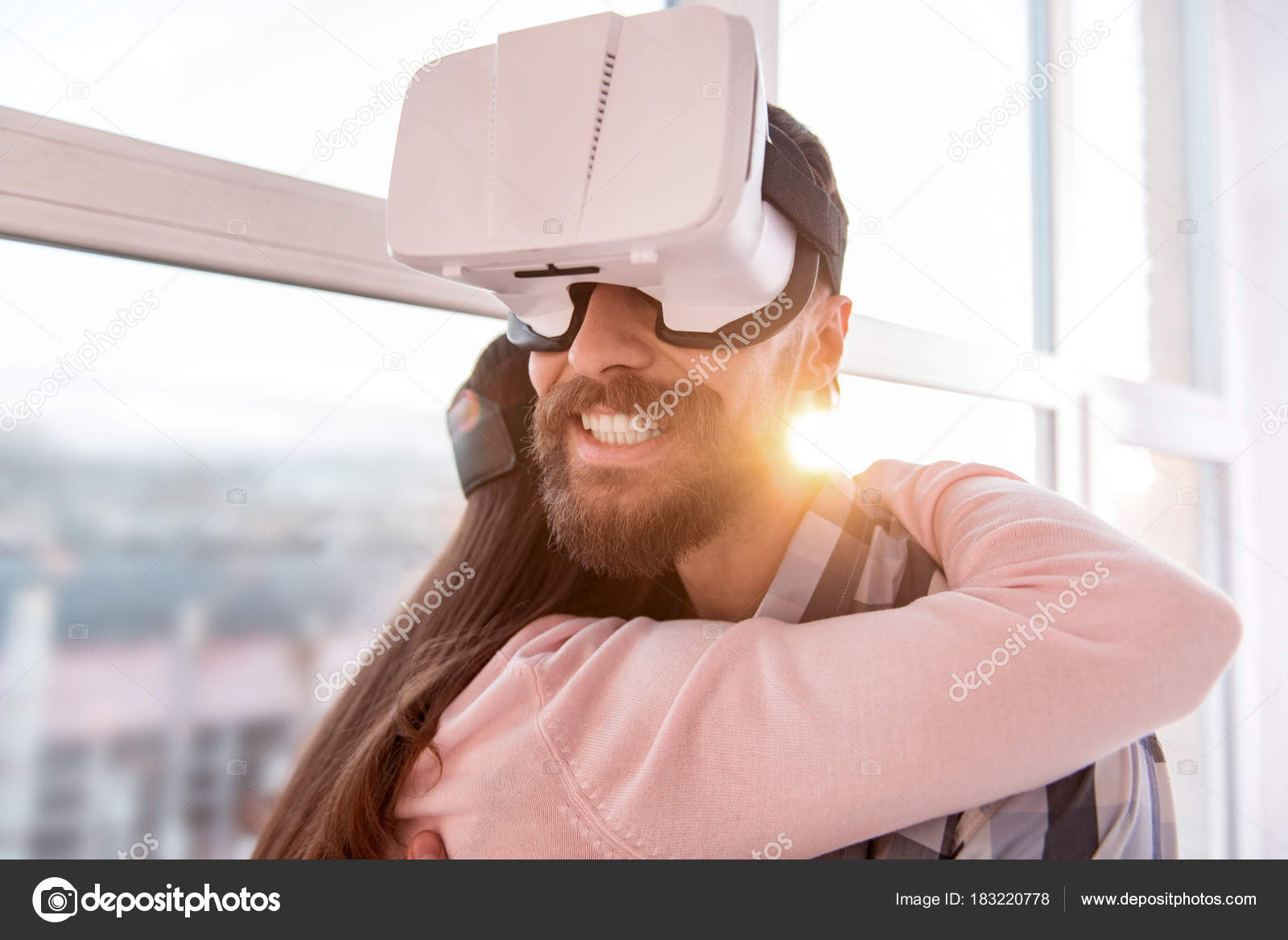 Young adorable couple hugging in VR glasses — Stock Photo © Dmyrto_Z ...