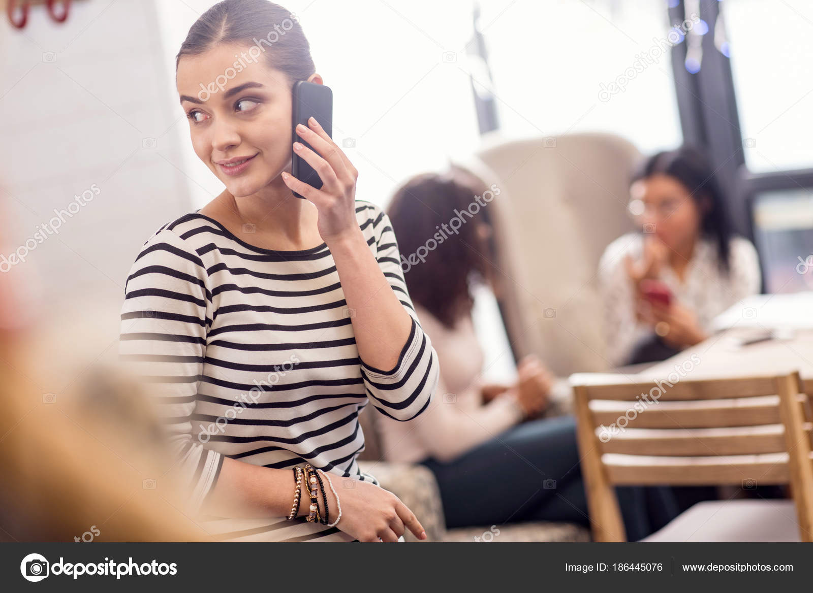 Attractive beautiful woman making call Stock Photo by ©Dmyrto_Z 186445076