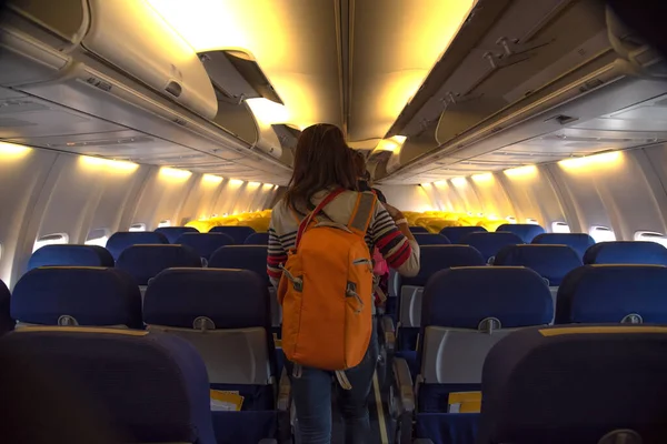 Woman Passenger Traveler Boarding Aircraft Looking Empty Overhead ...