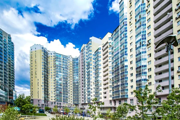 The facade of the new residential high-rise buildings against the sky ...