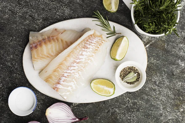 Cod fillet of cod fish with fresh vegetables: sweet pepper, rosemary ...