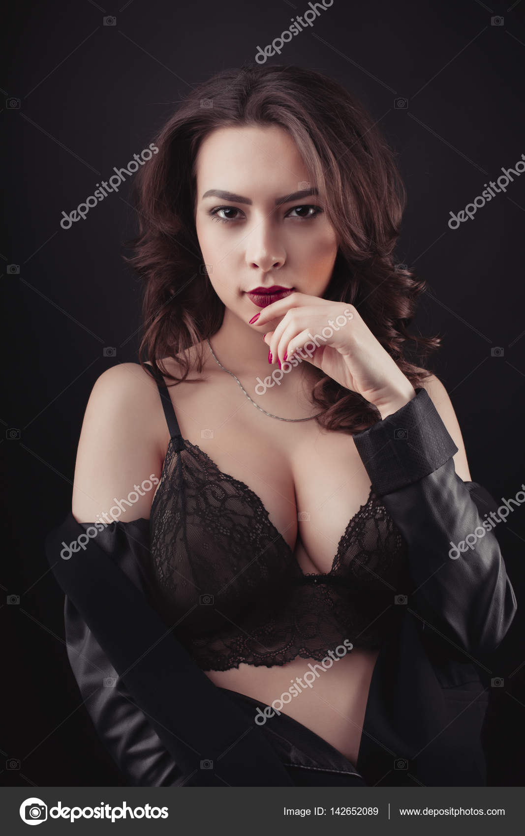 Beautiful woman in lace underwear and jacket on her shoulders Stock Photo by ©vika-pavlyuk 142652089
