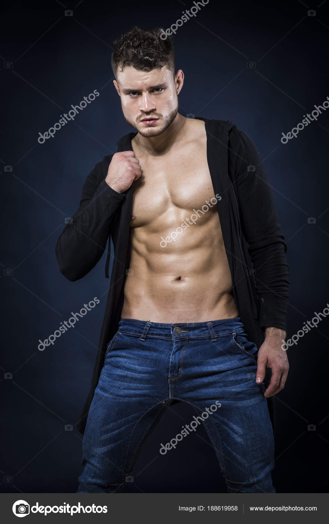 Mysterious strong man with black sweatshirt Stock Photo by ©camaralenta ...