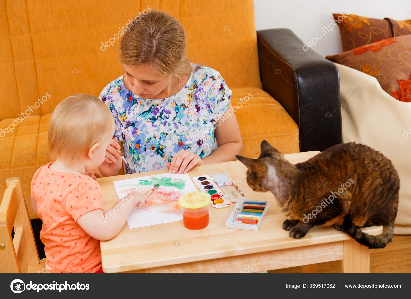Beautiful Mother Her Child Cat Stock Photo by ©racool_studio 369517062