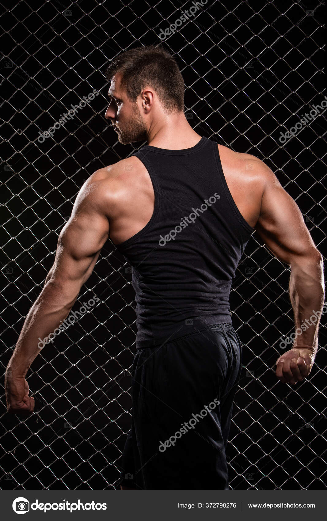 Beautiful Strong Man Fence Background Stock Photo by ©racool_studio ...