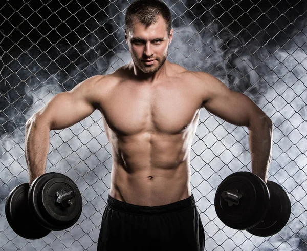 Beautiful Strong Man Dumbbell Fence Background Stock Photo by ©racool ...