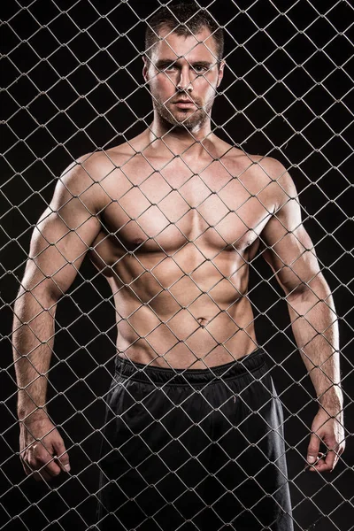 Beautiful Strong Man Fence Background Stock Photo by ©racool_studio ...