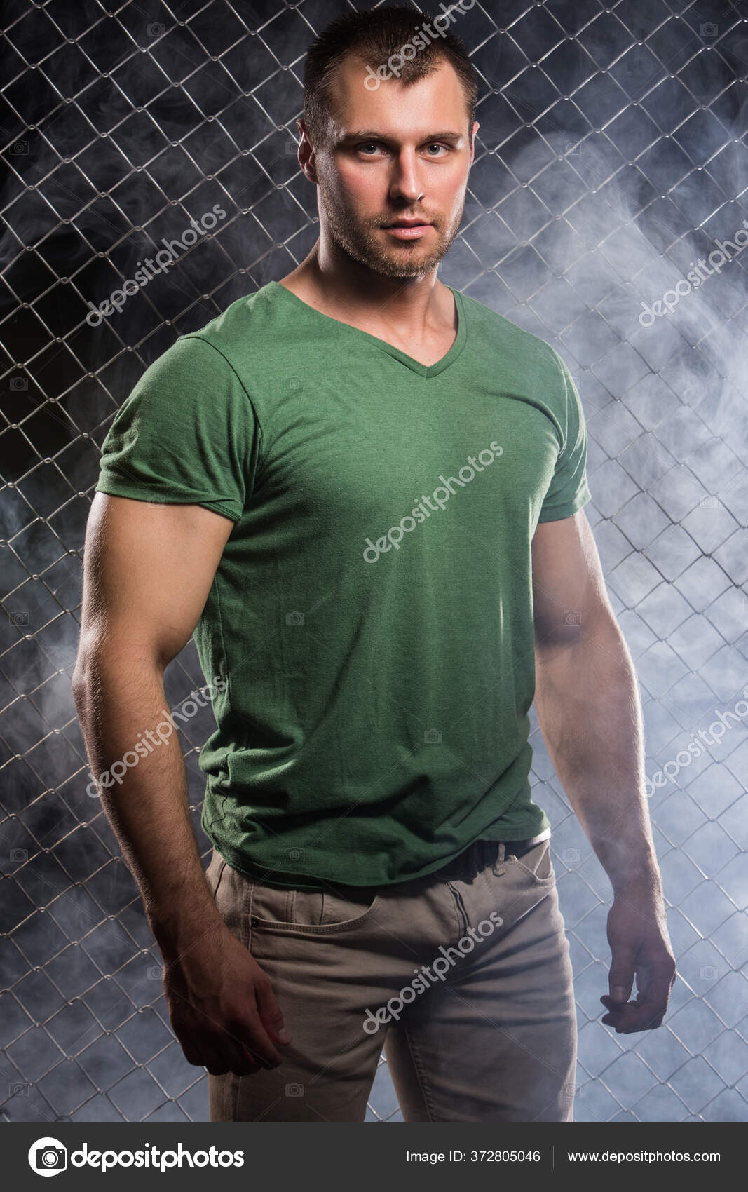 Beautiful Strong Man Fence Background Stock Photo by ©racool_studio ...