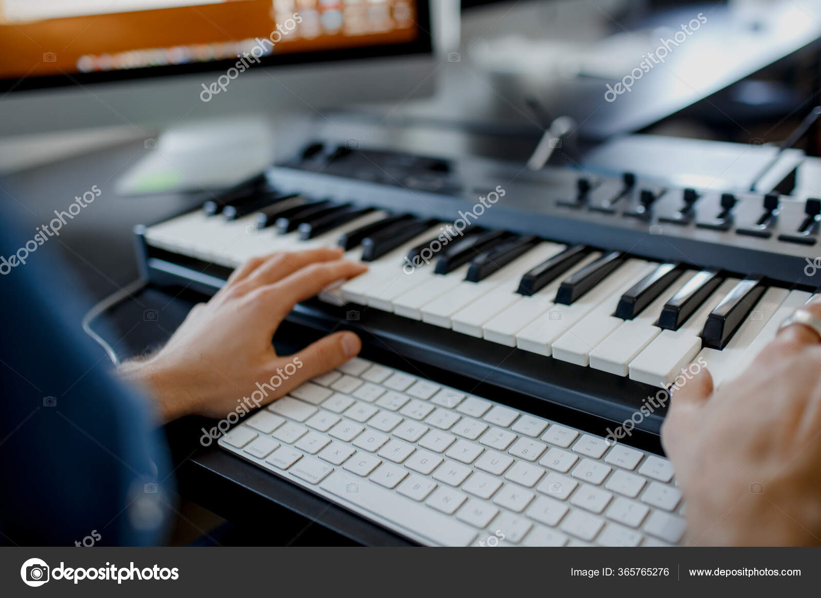 Composer hands on piano keys in recording studio. music production ...