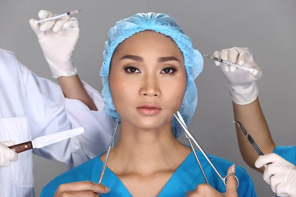 Asian Doctor Nurse check face structure before plastic surgery and ...