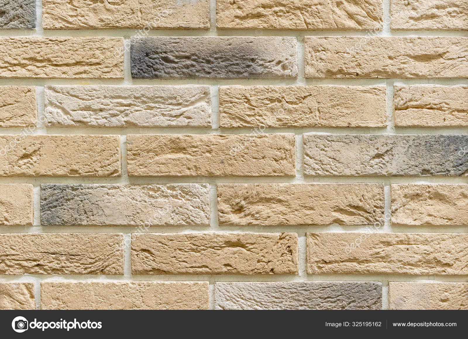 Brick wall of beige bricks. Background and texture of brickwork ...