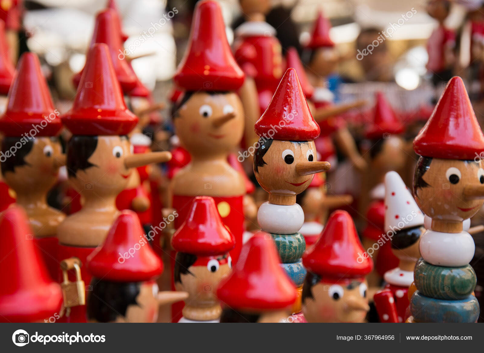 Wooden Puppet Set Long Nose Red Hats — Stock Photo © Eloy_CM #367964956
