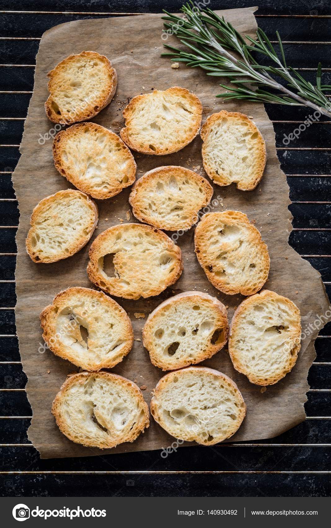 Toasted bread slices Stock Photo by ©VladislavNosick 140930492