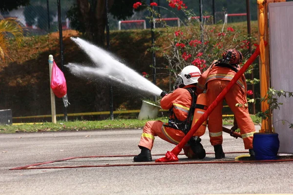 Singapore scdf firehose Stock Photos, Royalty Free Singapore scdf ...