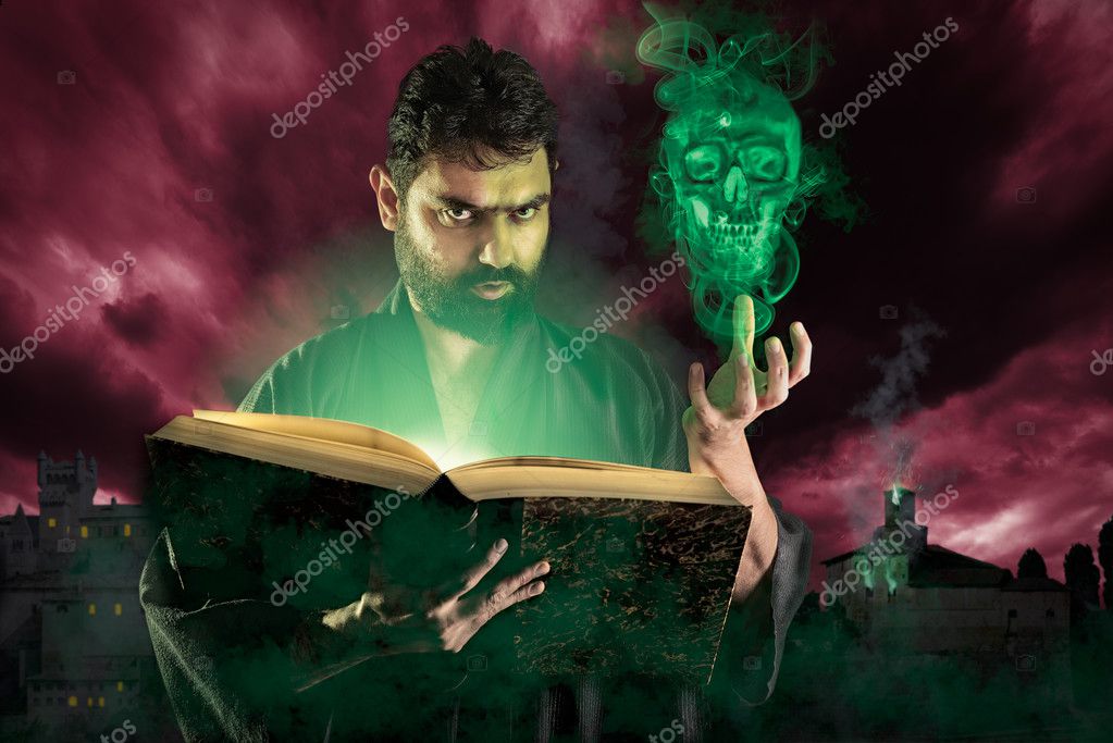 Male sorcerer casting a skull poison spell from a magic book as Stock ...