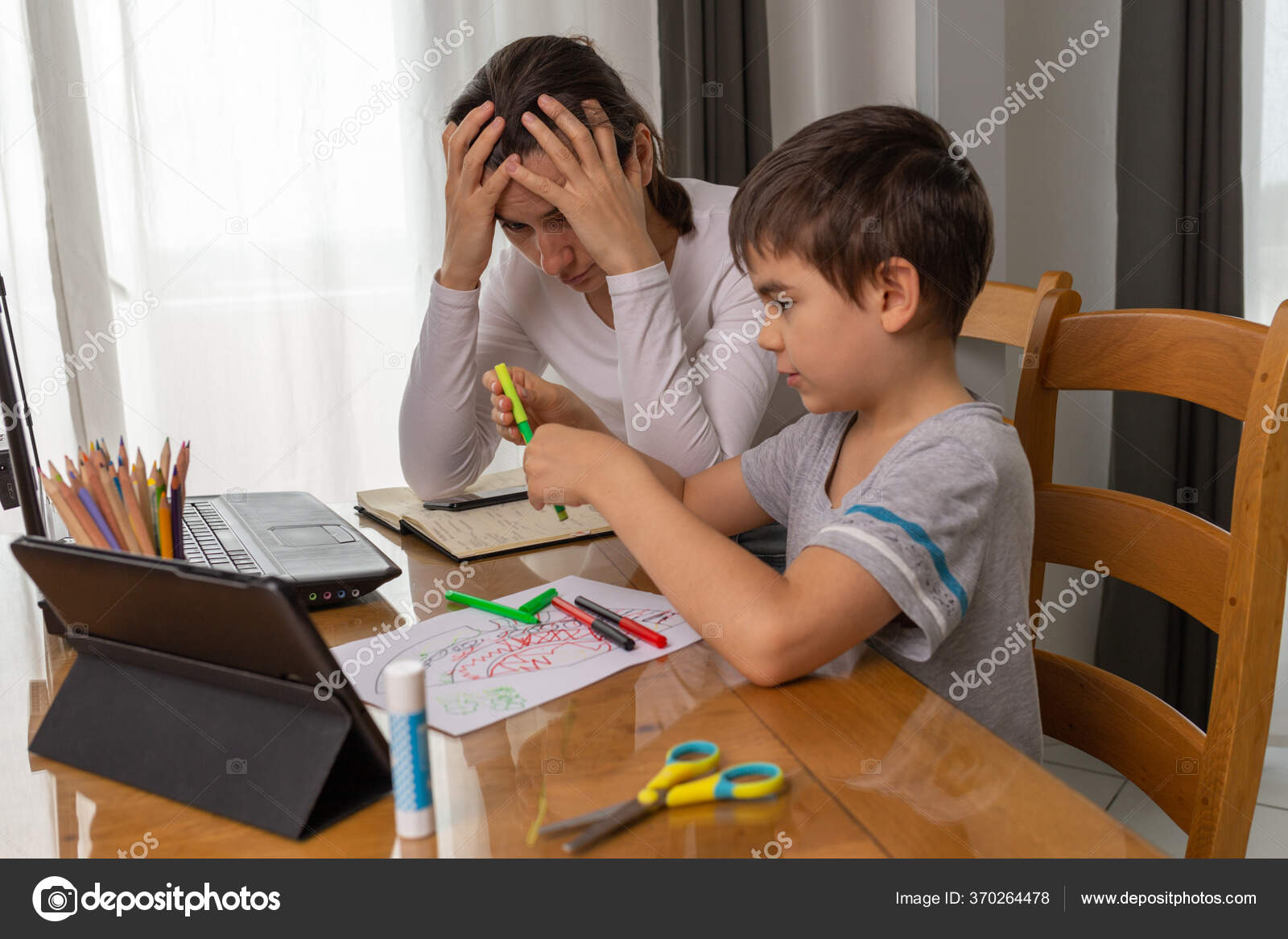 Parent And Child Doing Homework