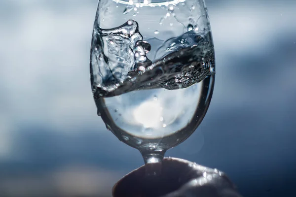 water in a cup glass in background - Stock Image - Everypixel