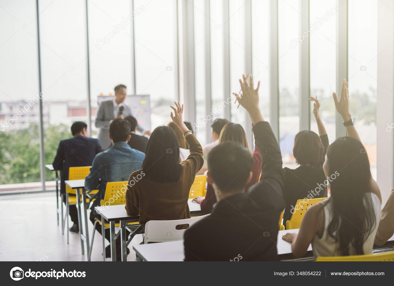 Hands Raised Up In Class