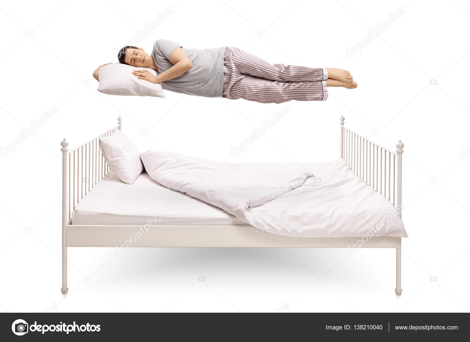 Man sleeping and floating above a bed Stock Photo by ©ljsphotography ...