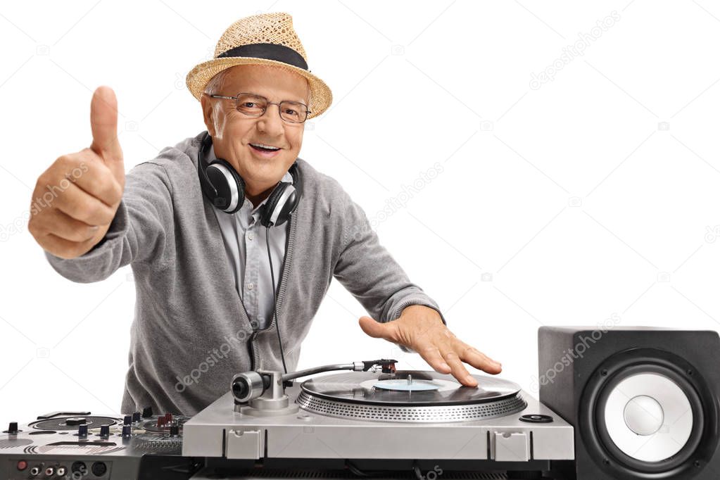 Old DJ making a thumb up gesture — Stock Photo © ljsphotography #170372446