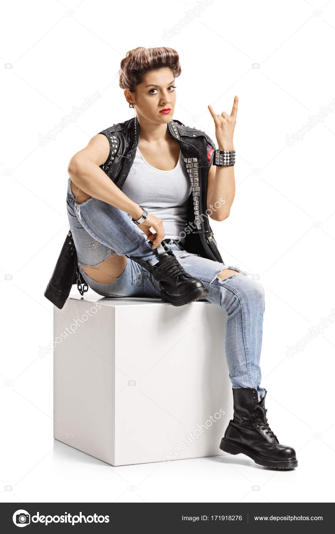 Punk girl making a rock hand gesture — Stock Photo © ljsphotography ...
