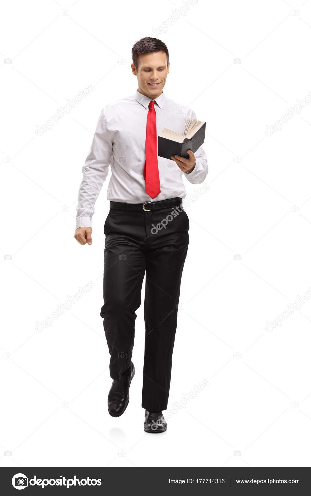 Elegant man walking and reading a book Stock Photo by ©ljsphotography ...