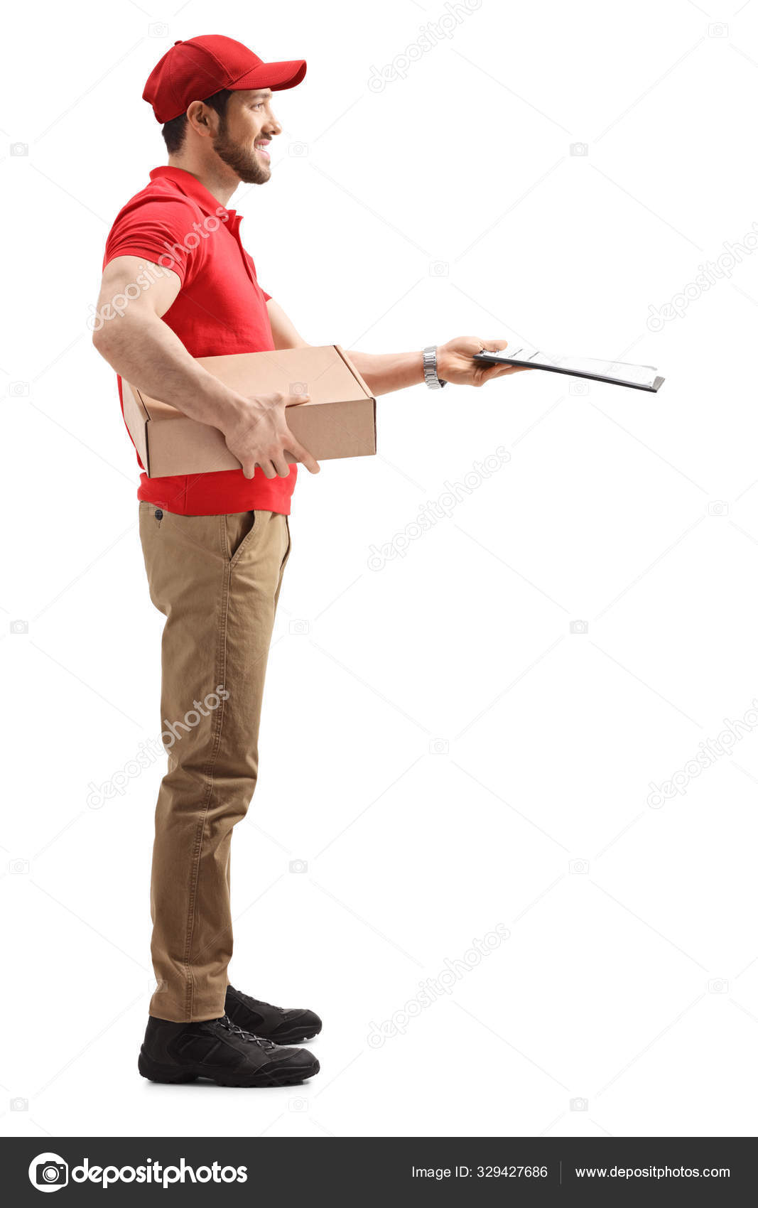 Postman delivering a package and holding a clipboard for signatu Stock ...