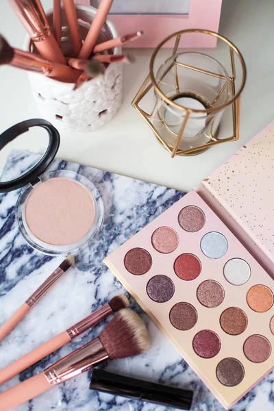 Cosmetics. Makeup. Dressing table. Home decor. Candle, eyeshadow ...