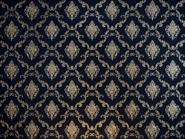 golden line thai pattern on navy blue fabric for background - Stock ...