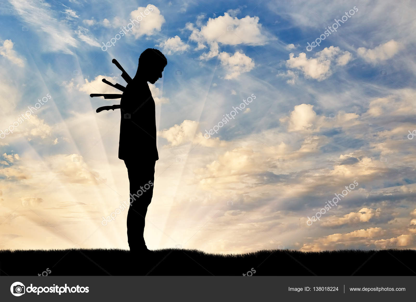 Silhouette of a sad man with a knives in his back — Stock Photo ...