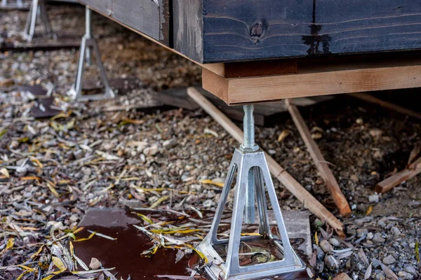 aluminium jack stands support wooden construction - Stock Image ...