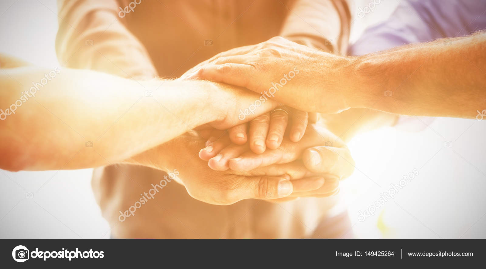 Business team stacking hands in office — Stock Photo © vectorfusionart ...