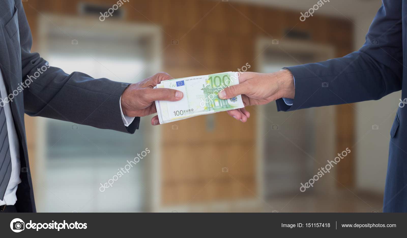 Hands holding money representing corruption concept Stock Photo by ...