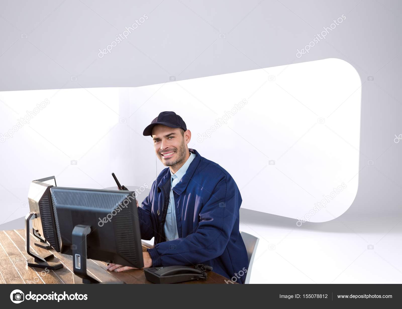 Security guard on his desk working. White office Stock Photo by ...
