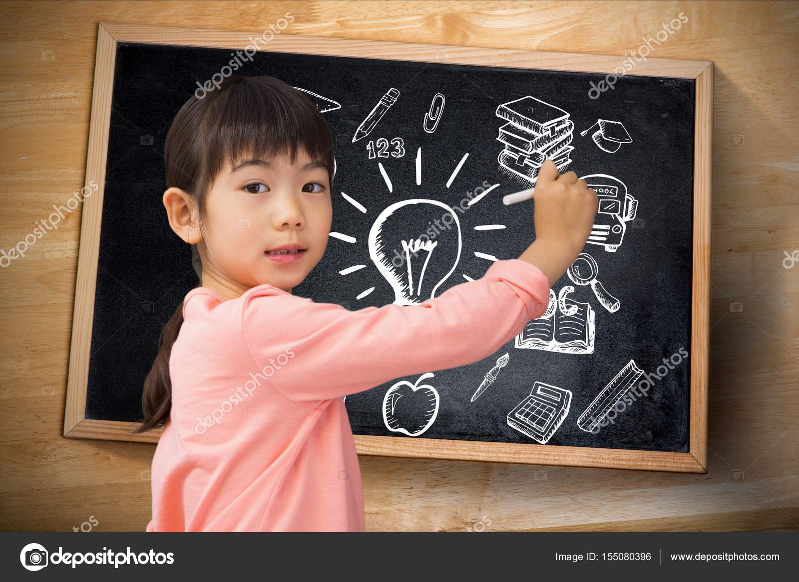 Young student against writing graphs on blackboard Stock Photo by ...