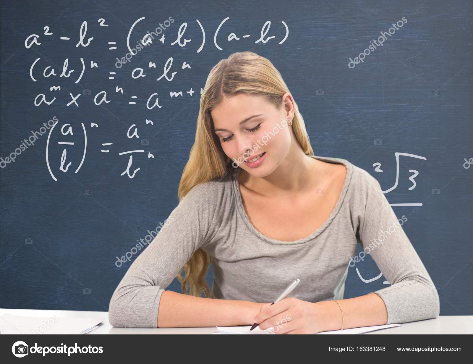 Student girl at table writing Stock Photo by ©vectorfusionart 163381248