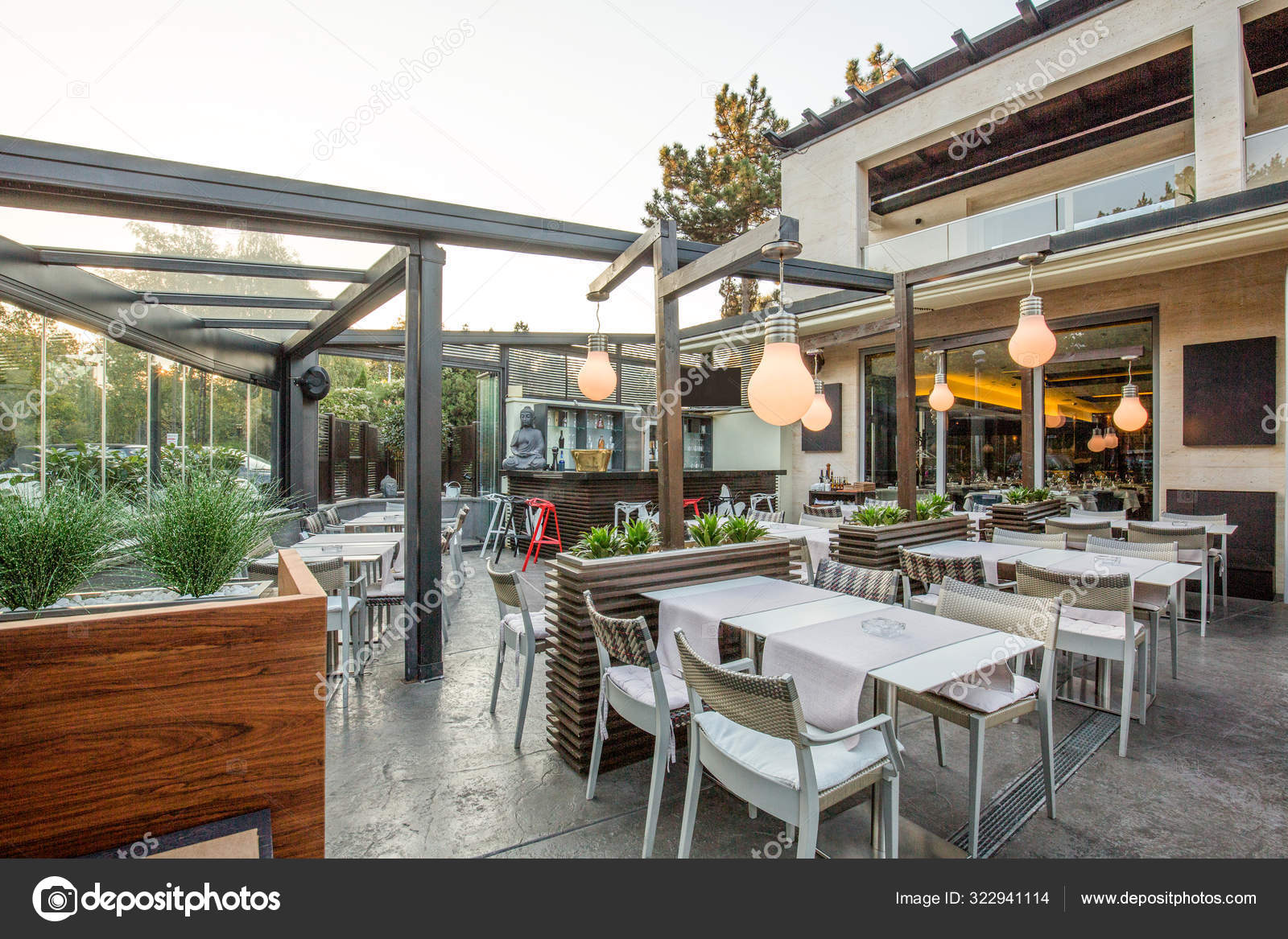 Restaurant with large open garden interior Stock Photo by ©rilueda ...